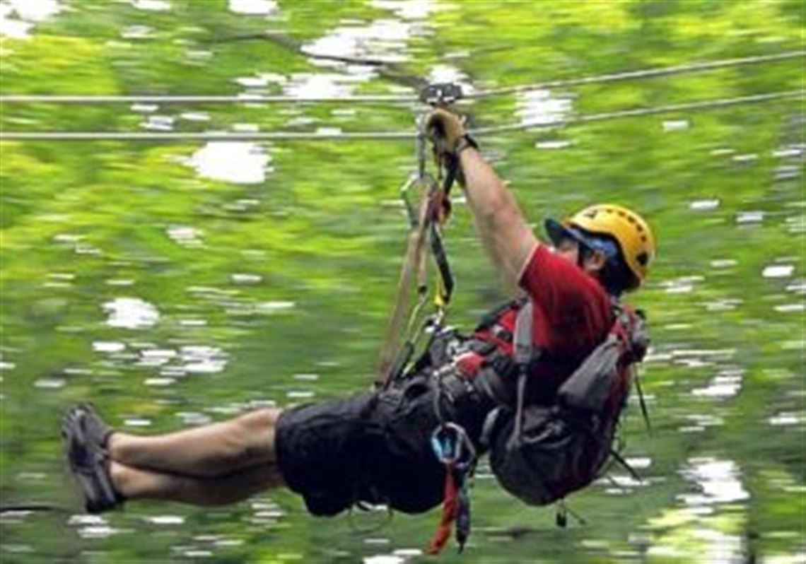 New Seven Springs zip lines let riders glide through trees, over slopes ...