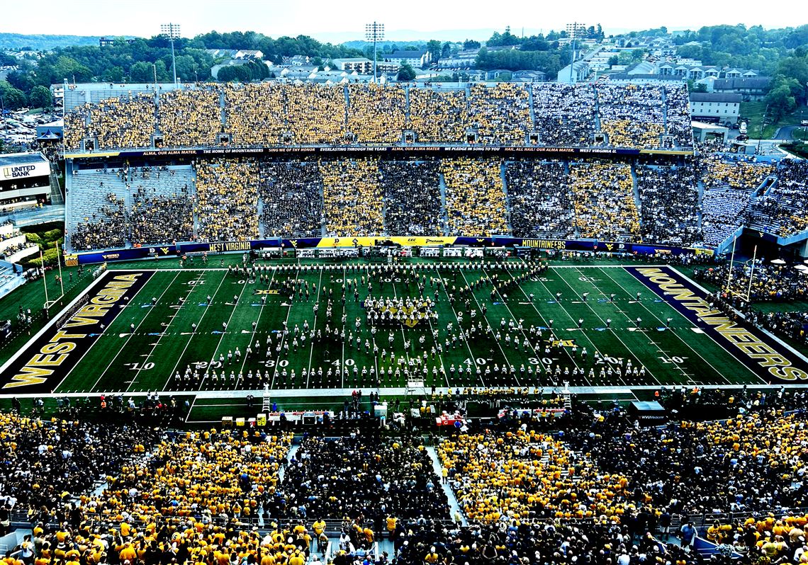 Penn State, West Virginia fans party then seek shelter during lightning ...