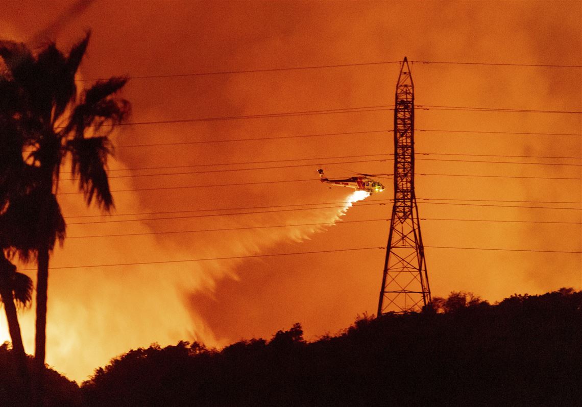 Fire battle in Mandeville Canyon: Inside the dramatic aerial attack ...