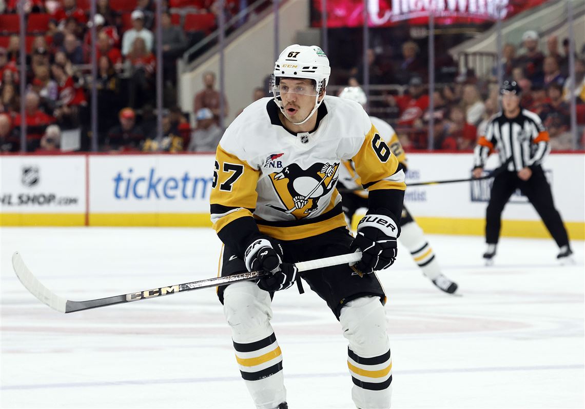As NHL trade rumors swirl, Rickard Rakell and Matt Grzelcyk hope to remain with Penguins ...